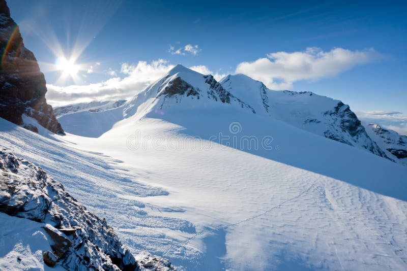 Castor and Pollux at Sunset Stock Photo - Image of alpine, glacier ...
