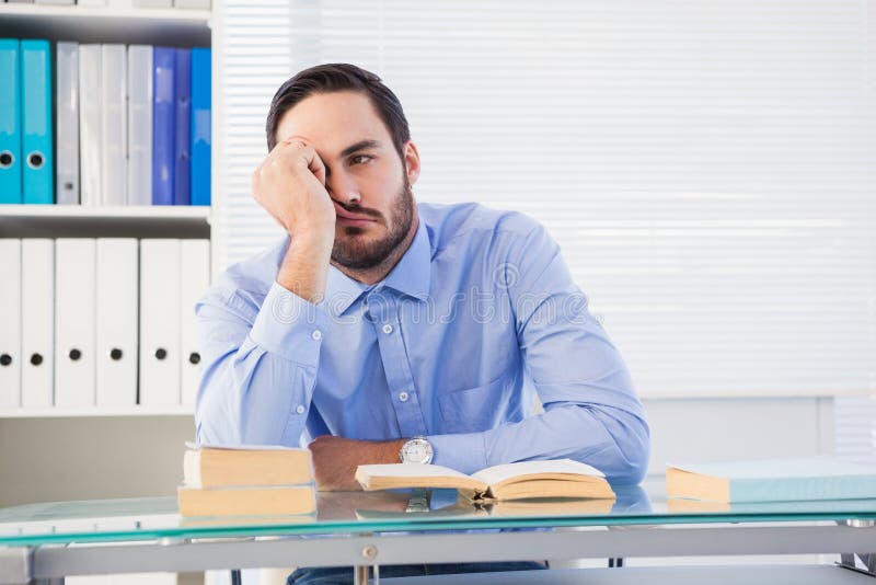 Casual Bored Businessman at His Desk Stock Image - Image of reading ...