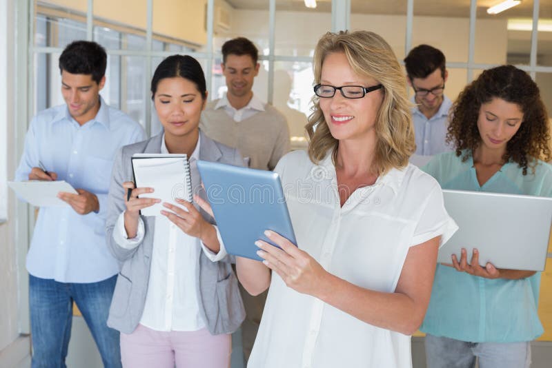 Casual Boss Standing in Front of Her Team All Taking Notes Stock Image ...