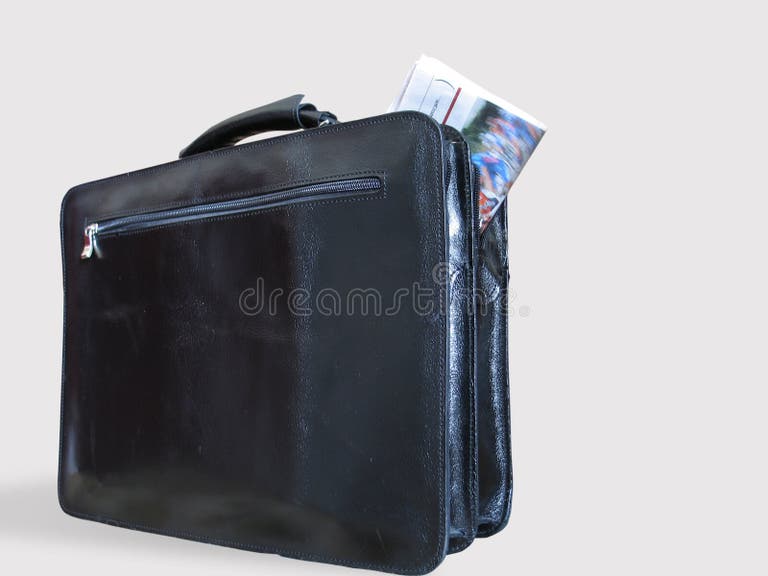 A Casual Briefcase and a Newspaper Inside it Stock Image - Image of ...