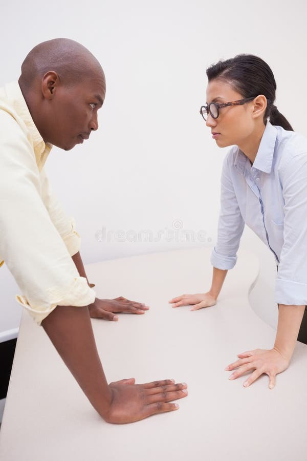 Casual Business Colleagues Facing Off Stock Image - Image of business ...