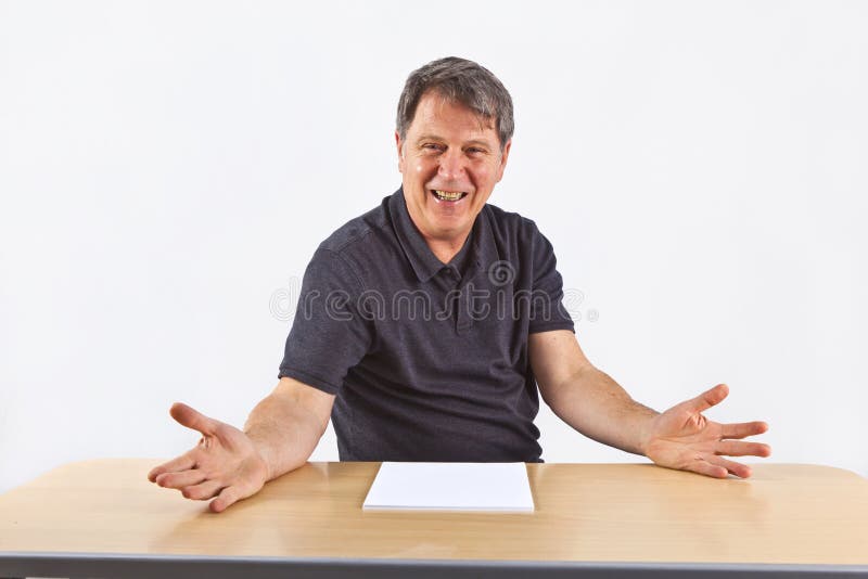Casual Business Man Sitting At A Table Stock Photo - Image of face ... Casual Business Man Sitting At A Table Stock Photo - Image of face ...