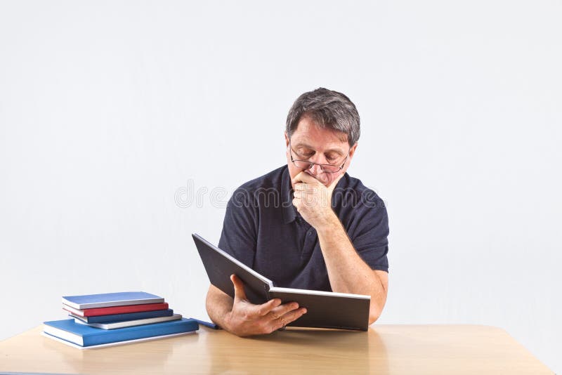 Casual Business Man Sitting at a Table Stock Image - Image of learning ...