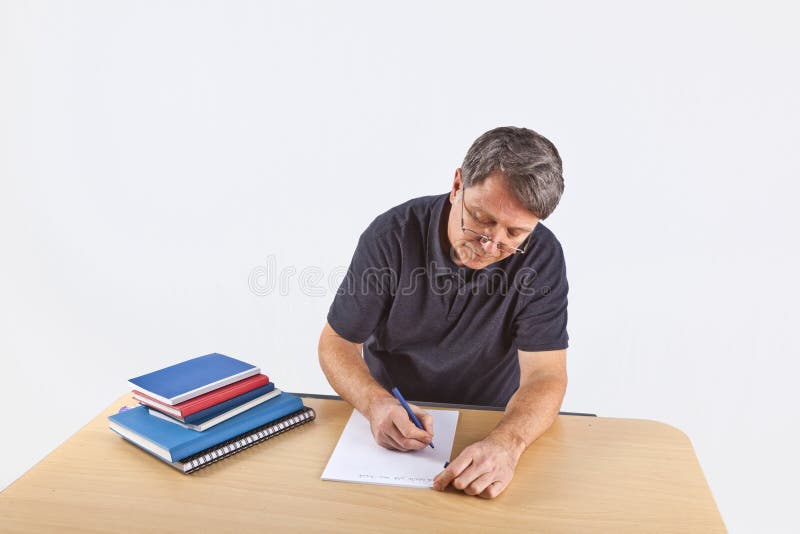 Casual Business Man Sitting at a Table Stock Image - Image of folder ...