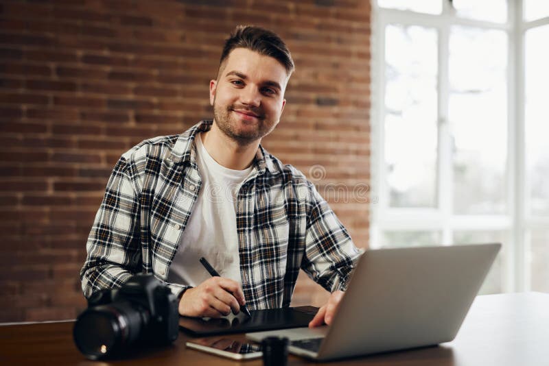 Casual Business Man with Stylus Pen Writing on Digital Notepad ...
