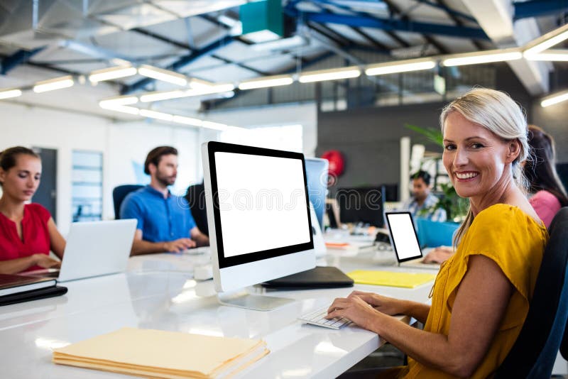Casual Business People Working on Computer Stock Photo - Image of happy ...