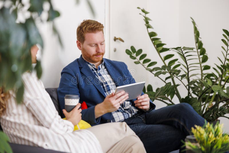 Casual Business People Working Together in an Office Stock Image ...
