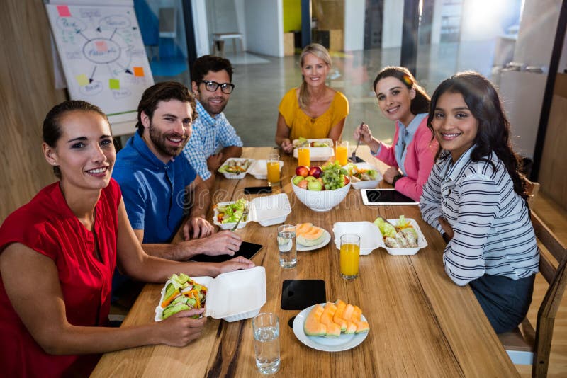 Casual Business Team Eating Together Stock Photo - Image of colleagues ...