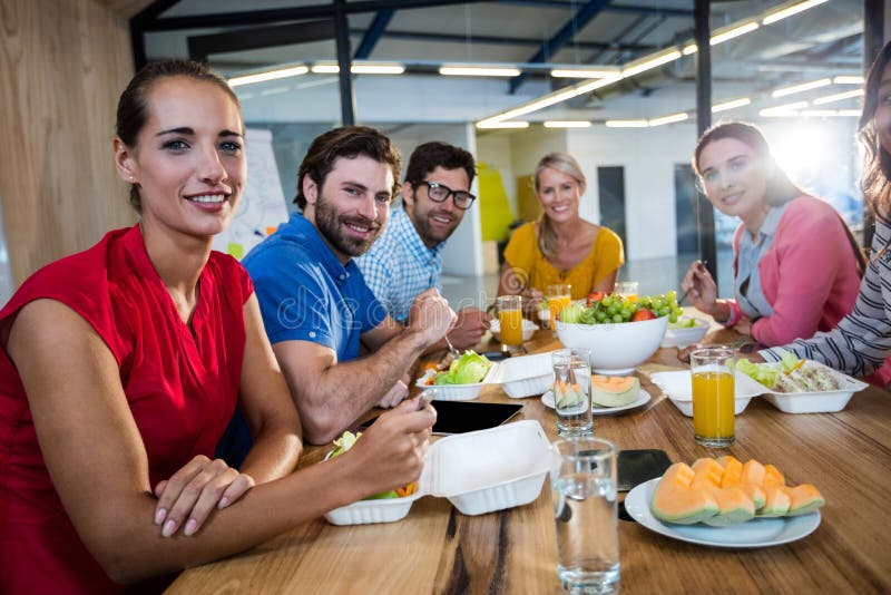 Casual Business Team Eating Together Stock Image - Image of female ...
