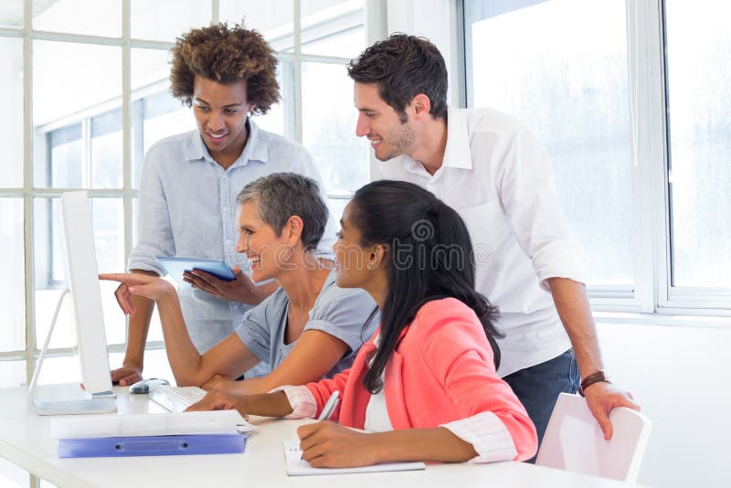 Casual Business Team Having a Meeting with Computer Stock Image - Image ...