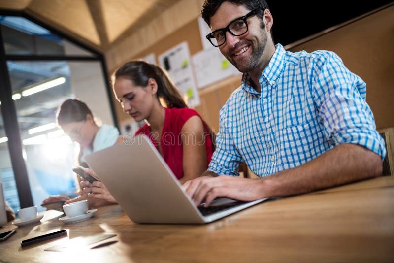 Casual Business Team Using Technology Stock Photo - Image of graphic ...