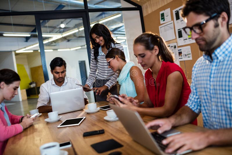 Casual Business Team Using Technology Stock Photo - Image of company ...