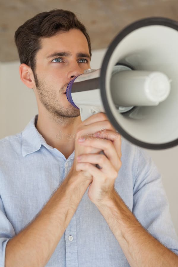 Casual Businessman Talking through Megaphone Stock Photo - Image of ...