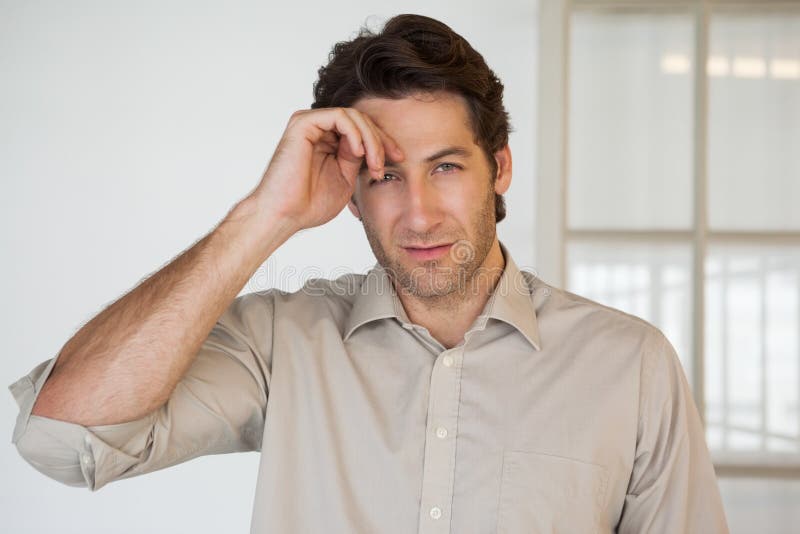 Casual Businessman Thinking and Frowning Stock Photo - Image of ...