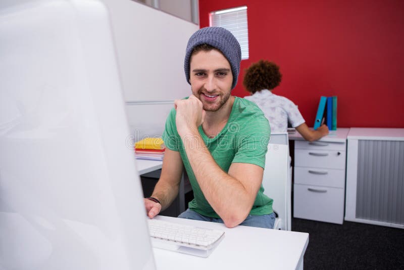 Casual Businessman Using Computer in Office Stock Image - Image of ...