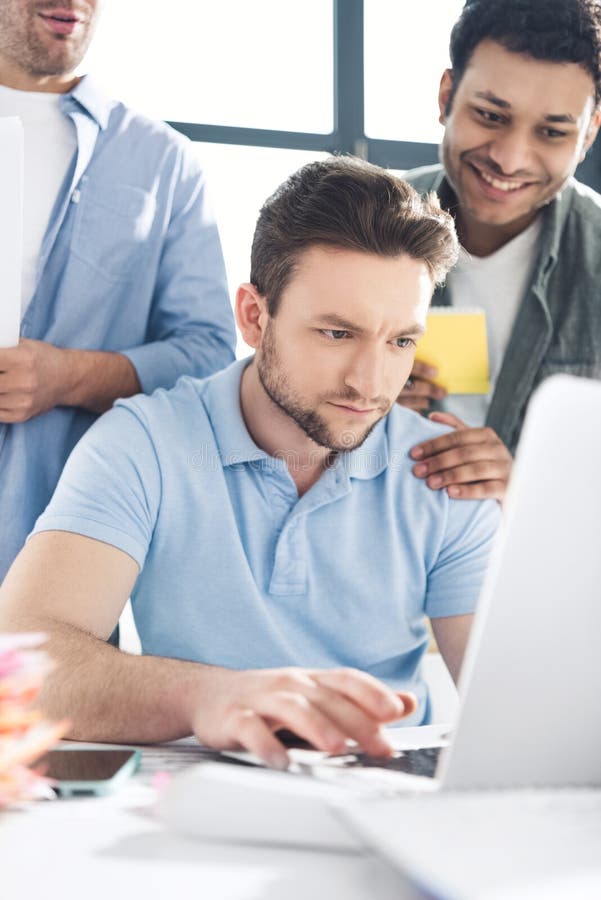 Casual Businessmen Working on New Project at Modern Office Stock Photo ...