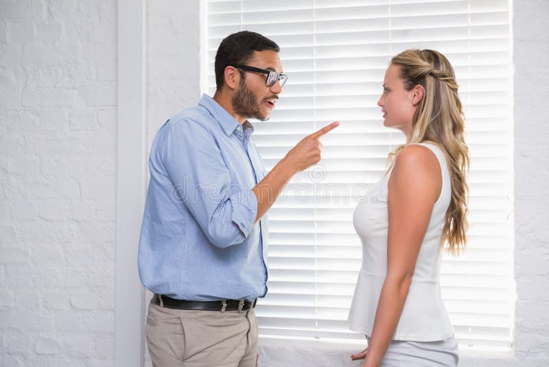 Casual Colleagues in an Argument at Office Stock Photo - Image of ...