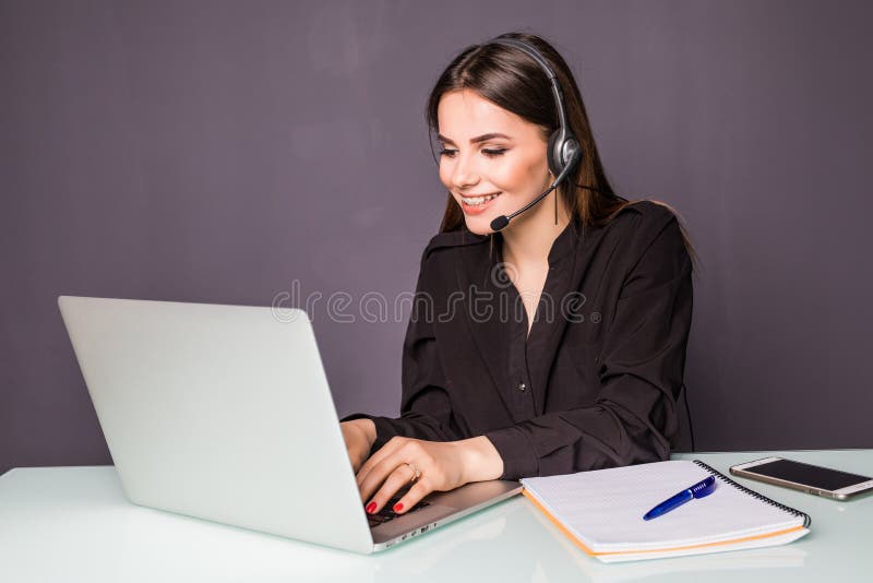 Casual Customer Support Worker in Office with Headset and Laptop in ...