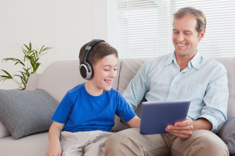 Casual Father and Son Using Tablet Pc Stock Image - Image of household ...