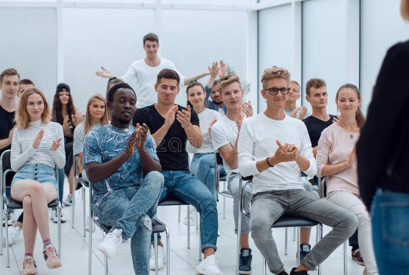 Casual Group of Young People Meditating Sitting on the Floor. Stock ...