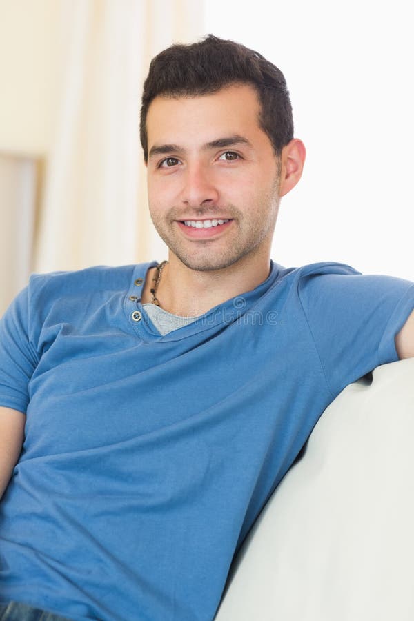 Casual Handsome Man Relaxing on Couch Stock Photo - Image of handsome ...