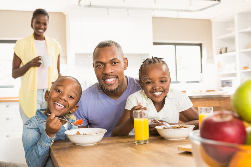 Casual Happy Family Having Breakfast Stock Photo - Image of father ...