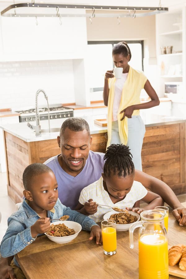 Casual Happy Family Having Breakfast Stock Photo - Image of home, homey ...