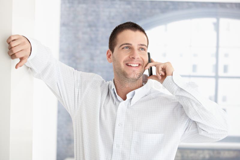 Casual Man Chatting on Mobile Smiling Stock Photo - Image of happiness ...