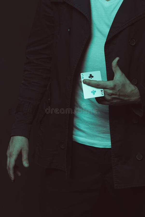 Casual Man Holding Playing Card Stock Photo - Image of three, trick ...