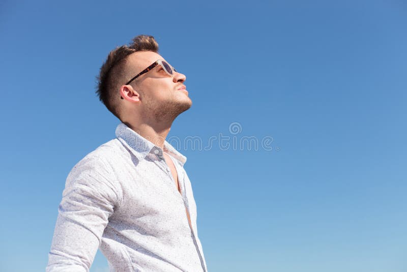 Casual Man Looking at the Sun Stock Photo - Image of clear, light: 31846380
