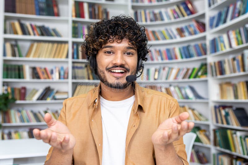 Casual Man with Outstretched Hands in a Library, Concept of Choice and ...