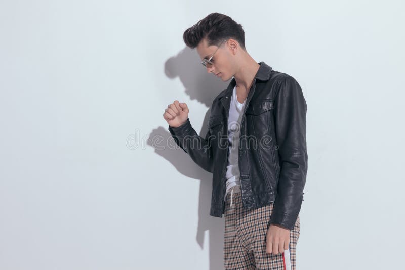 Casual Man Posing while Looking Down with Dramatic Stance Stock Image ...