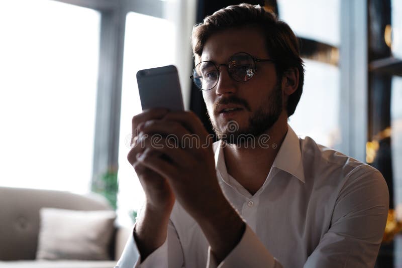 Young Man Browsing Internet at Home Smiling Stock Photo - Image of ...