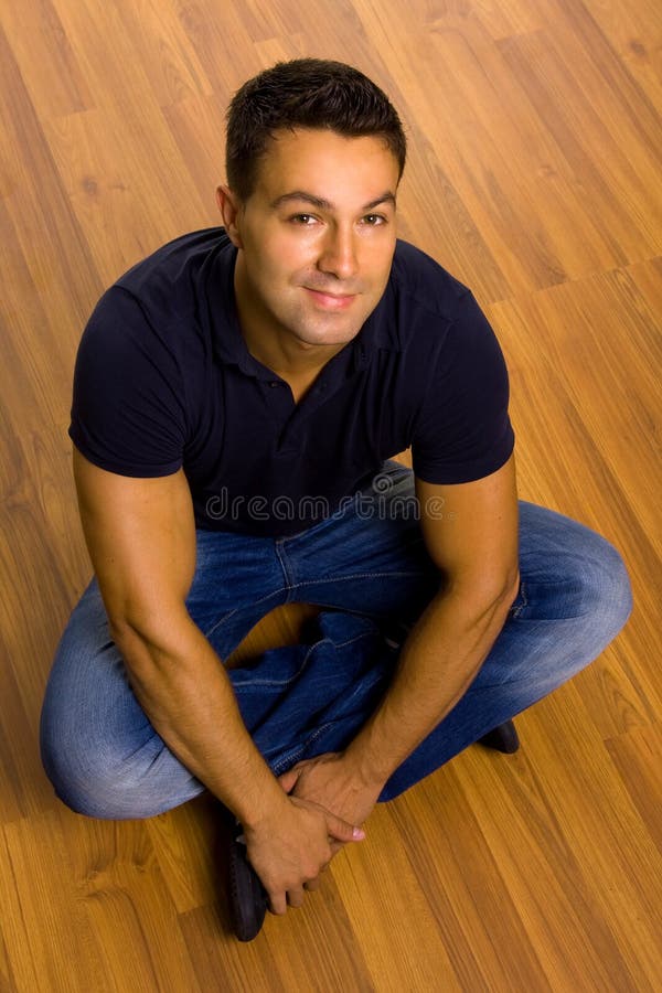 Casual Man Sitting on the Floor Stock Image - Image of male, clothing ...