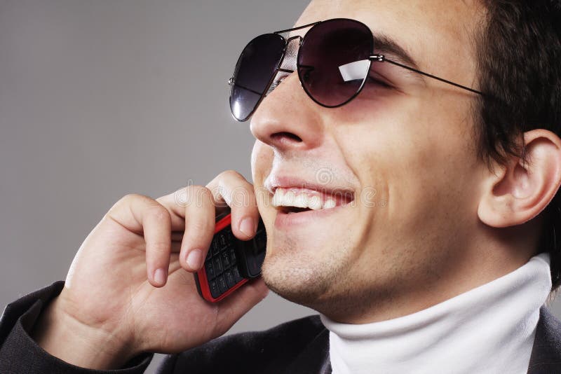 Casual Man Speaking on His Phone Stock Image - Image of young, cell ...