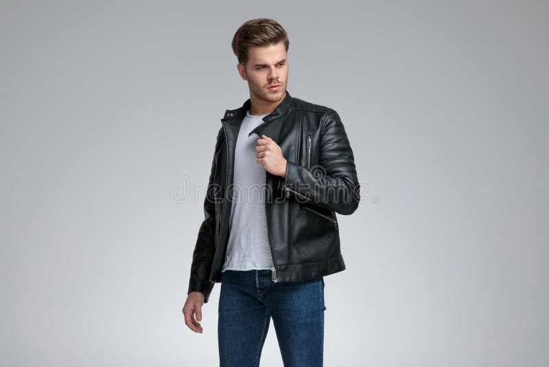 112 Casual Fashion Man Pulling His Leather Jacket Stock Photos - Free ...