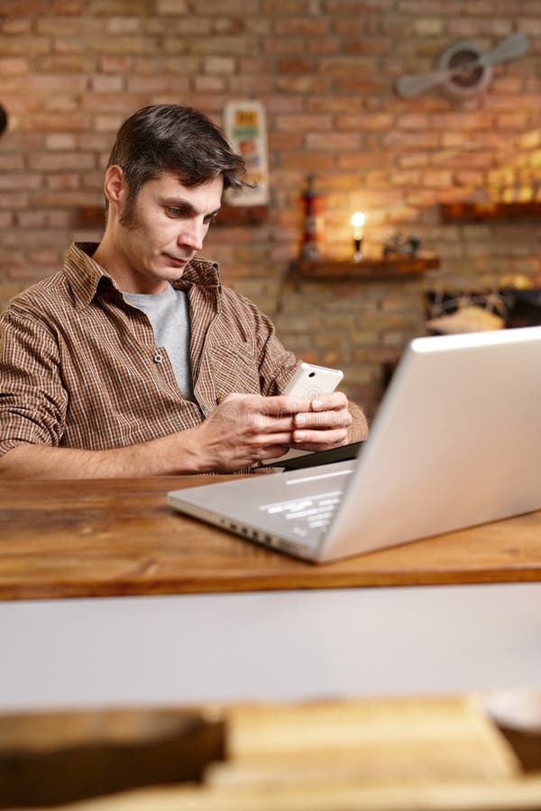 Casual Man Texting on Mobile Stock Photo - Image of mobilephone, laptop ...