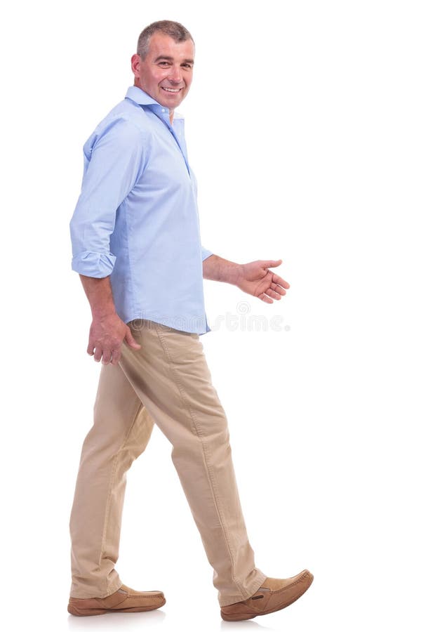 Casual Middle Aged Man Walks To the Camera Stock Image - Image of ...