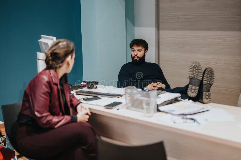 Casual Office Conversation Observed during a Relaxed Business Meeting ...