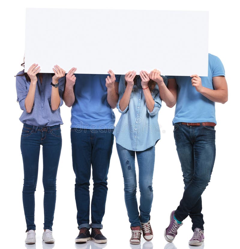 Casual People Hiding Their Faces Behind a Blank Banner Stock Photo ...