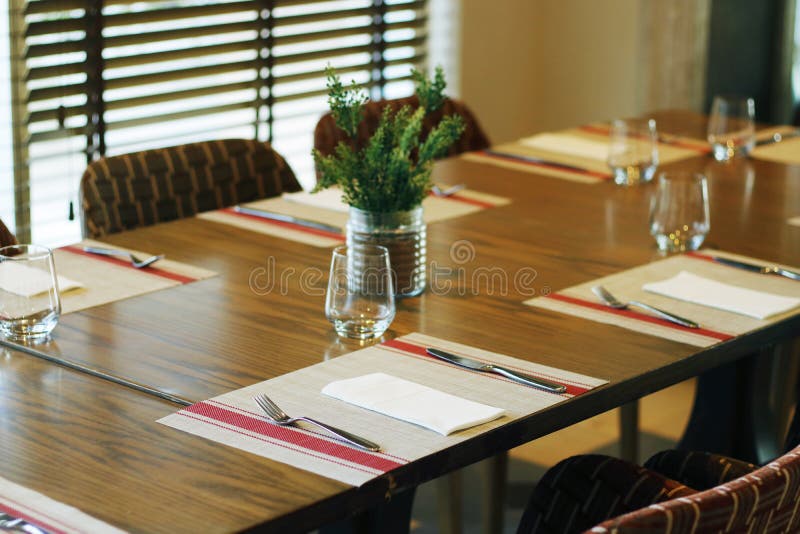 Casual Restaurant Dining Table Set Up, with Dark Brown Color Theme ...