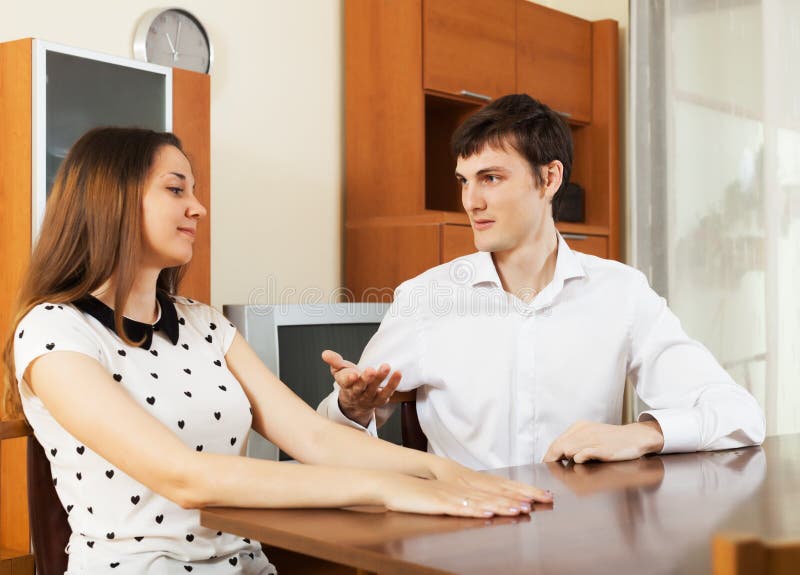 Casual Young Couple Having Serious Talking Stock Image - Image of ...