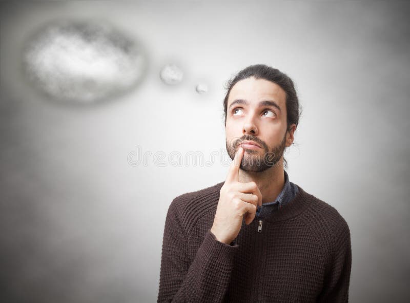 Casual young man thinking stock photo. Image of idea - 51248610