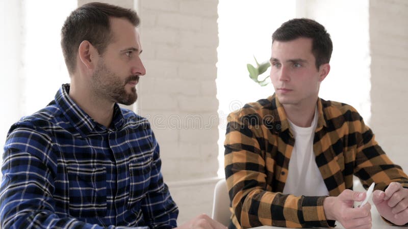 The Casual Young Men Talking with Each Other Stock Image - Image of ...