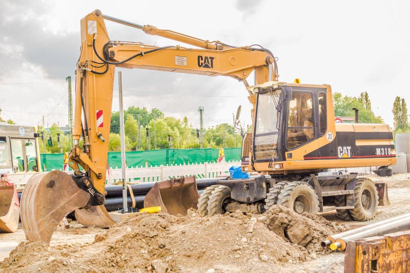 Cat excavator editorial stock image. Image of excavator - 42632964