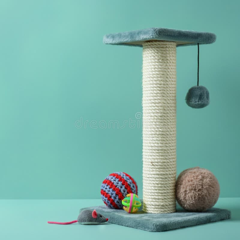 A Cat Scratching Post on a Light Teal Background Features a Vertical ...
