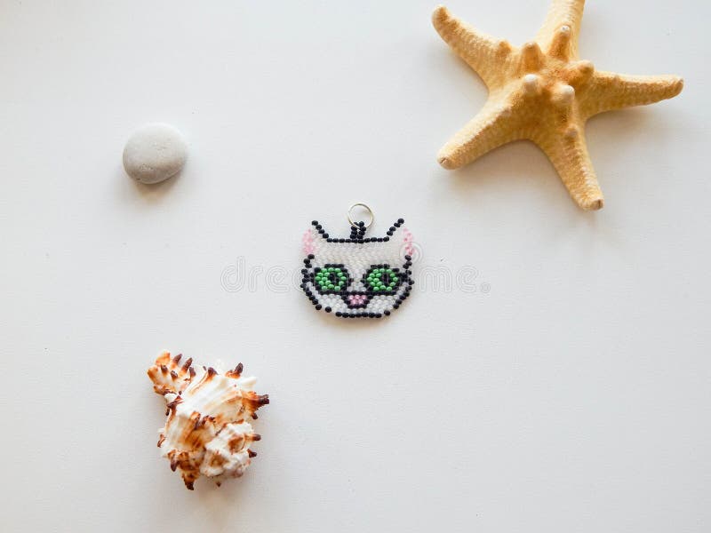 Cat Shaped Handmade Bead Pendant and Sea Shells Stock Image - Image of ...