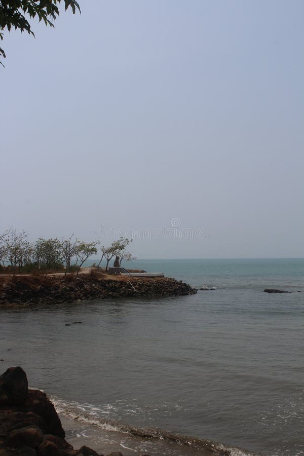A Cat Statue Stands on Anyer Beach Stock Image - Image of cape, beach ...
