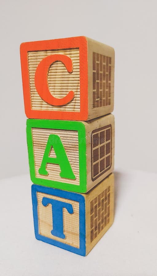 Cat toys blocks stock image. Image of play, spell, green - 209529191