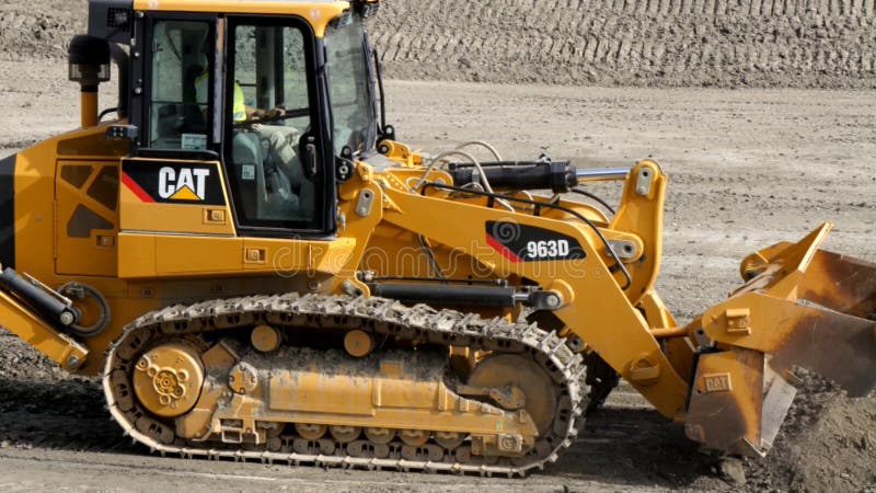 CAT Truck Type Loader 963D stock video. Video of malaga - 51336075